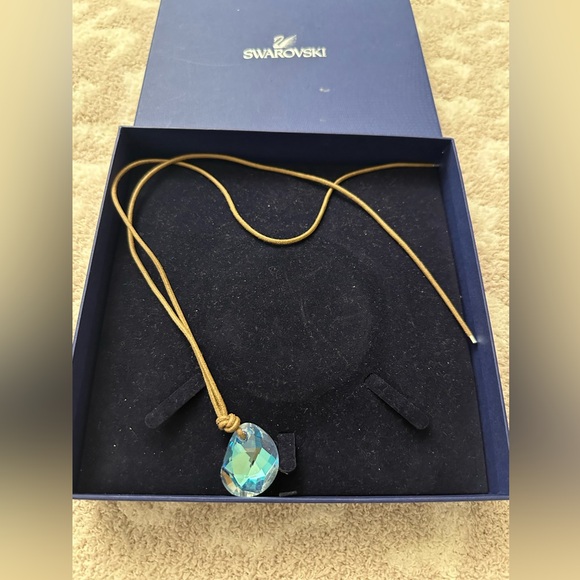 Swarovski | Jewelry | Swarovski Crystal Galet Light Azore Blue Pendant ...